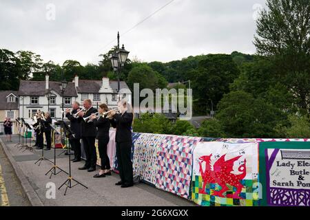 The Ifton Colliery Band play by artist Luke Jerram's new artwork ...