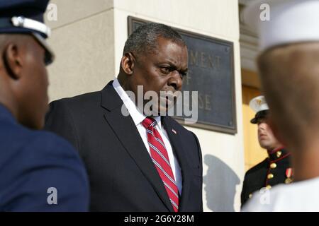 Defense Secretary Lloyd Austin waits for the arrival of Japanese ...