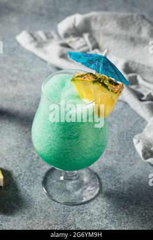 Boozy Refreshing Frozen Blue Hawaii Cocktail with Pineapple and Rum ...