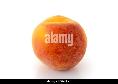 Italian Percoca peach variety with yellow flesh, one whole e altra in ...