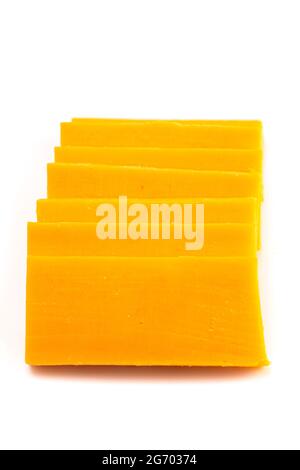Rectangle Slices of Sharp Cheddar Cheese Isolated on a White Background ...