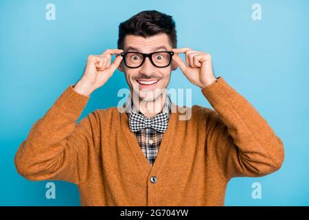 Photo of young brunette impressed guy wear yellow shirt isolated on ...