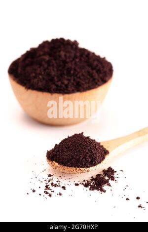 Wooden spoon and acai powder on white background Stock Photo - Alamy
