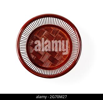 Empty white rustic plate on the background of a light striped ...