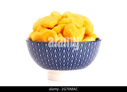 A Bowl of Cheddar Cheese Curds Isolated on a White Background Stock ...
