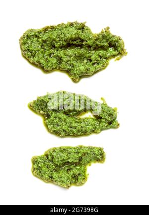 Smears of tasty pesto sauce on white background Stock Photo - Alamy
