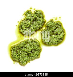 Smears of tasty pesto sauce on white background Stock Photo - Alamy