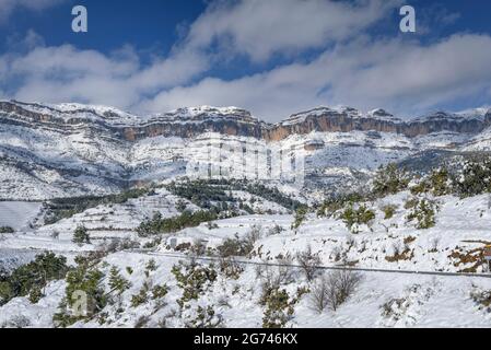 Montsant snowy mountain range in winter, seen from near Scaladei ...