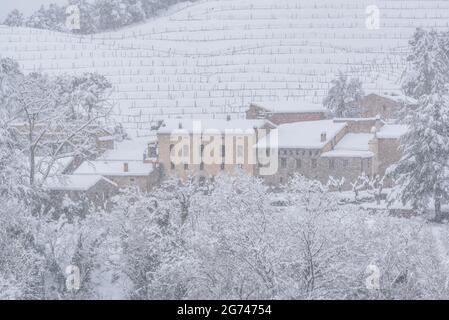Priorat vineyards and a country house under a heavy winter snowfall ...