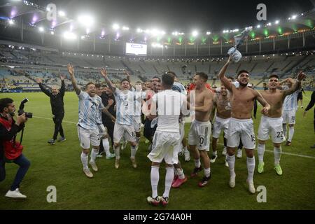 Teammates lift Argentina's Lionel Messi after their 1-0 victory over ...