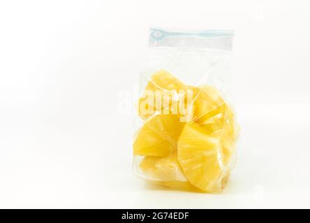 pineapple cut in plastic packaging Stock Photo - Alamy