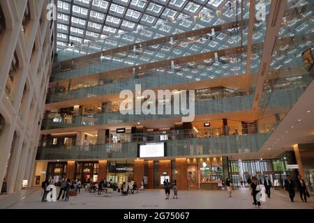 Tokyo, Marunouchi. KITTE building interior. The triangular atrium ...