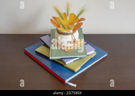 Stack of different books on dark background. Knowledge concept Stock ...