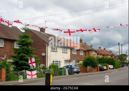 Slough, Berkshire, UK. 11th July, 2021. England flags and bunting hang ...