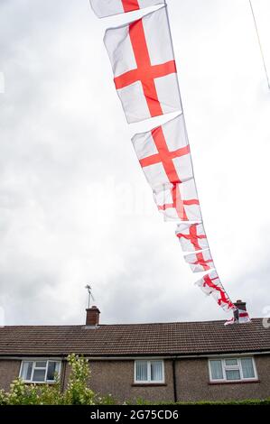 Slough, Berkshire, UK. 11th July, 2021. England flags and bunting hang ...