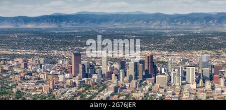 aerial view above Denver Colorado skyline to Rocky Mountain Front Range ...