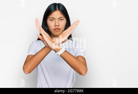 Japanese gesture for no. Crossed fingers, hands crossing forefinger ...