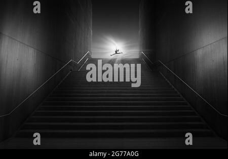 A grayscale shot of dark walls against the background of the cloudy sky ...
