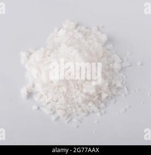 Pile of salt crystals isolated over the white background. Top view ...