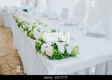 Beautiful table setup in a hall for a wedding ceremony Stock Photo - Alamy