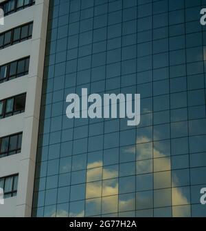 exterior of modern glass business center Stock Photo - Alamy