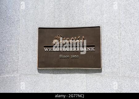 Historic Wells Fargo Bank plaque mounted on stone exterior wall of ...