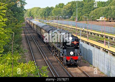 Preserved and restored steam locomotive, 34064 'Braunton' approaches ...