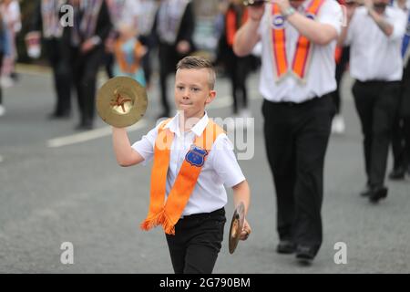 The Orange Order parade in the village of Hillsborough, Co.Down, as ...