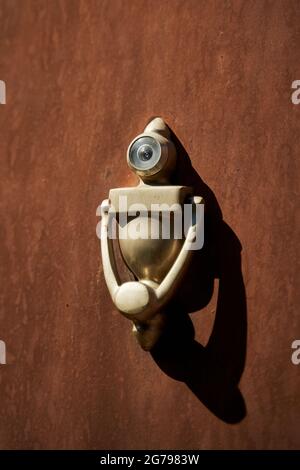 Unusual stylish door knocker in the shape of a robot Stock Photo - Alamy