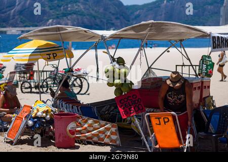 Happy Shopping from beach venors at Paria do Flamengo Beach on a sunny ...