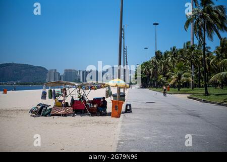 Happy Shopping from beach venors at Paria do Flamengo Beach on a sunny ...