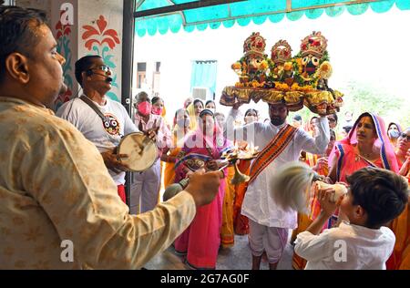 A priest perform worship to Lord Krishna on the occasion of ' Krishna ...