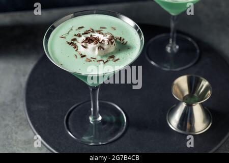Boozy Frozen Mint Chocolate Chip Martini with Whipped Cream Stock Photo ...