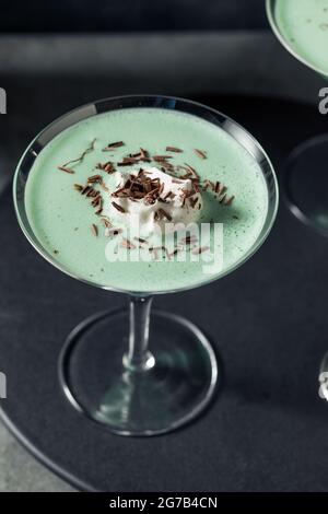 Boozy Frozen Mint Chocolate Chip Martini with Whipped Cream Stock Photo ...