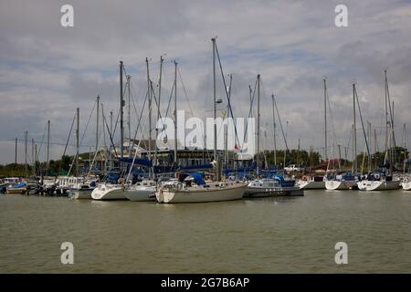 A ship sailing in the River Arun Estuary into Littlehampton docks in ...