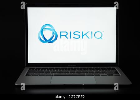 RiskIQ company logo seen on the smartphone and Microsoft logo on the ...