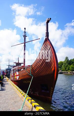 KOLOBRZEG, POLAND - Jul 25, 2015: A board with excursion offers at the ...