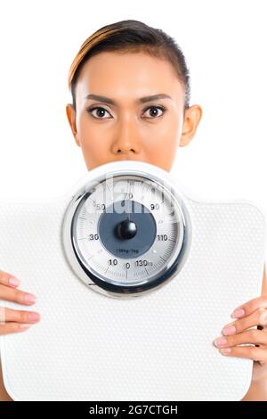 Asian woman with weight scale loosing weight Stock Photo - Alamy