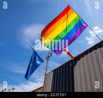Rainbow LGBT flags against blue sky on a sunny day. Poznan. Poland ...