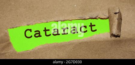 Cataract word written under brown torn paper. Eyes healthcare concept ...