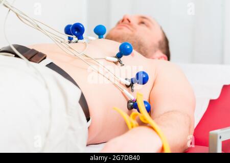 Male patient having ECG electrocardiogram in hospital Stock Photo - Alamy