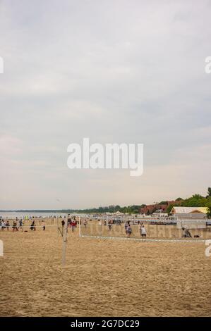 SOPOT, POLAND - May 30, 2016: A man with his dogs standing on the Sopot ...