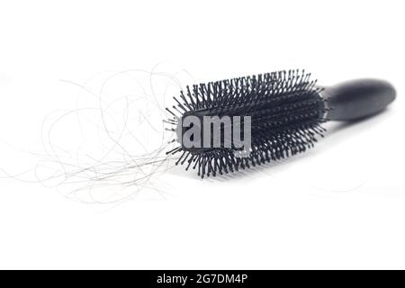 Hair fall at white Black plastick comb, White Background Stock Photo ...