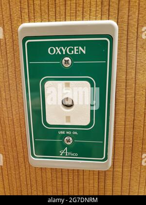 Close-up shot of the Amico medical air wall outlet with the company ...
