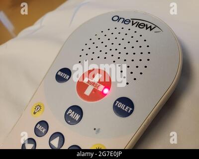 Close-up of OneView call light with Nurse button in a medical setting ...