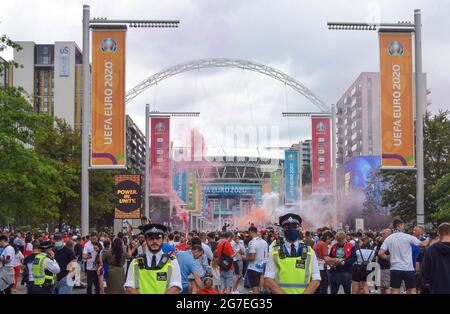 Police officers monitor stadium security during a sporting event ...