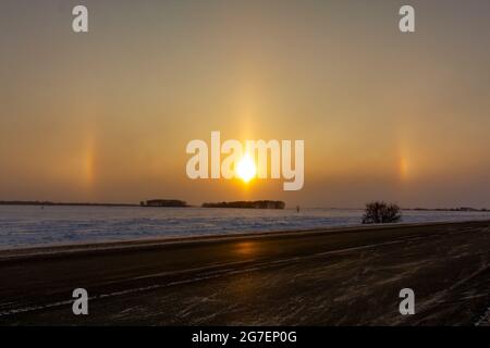 Solar halos an atmospheric optical phenomenon consisting of a bright ...