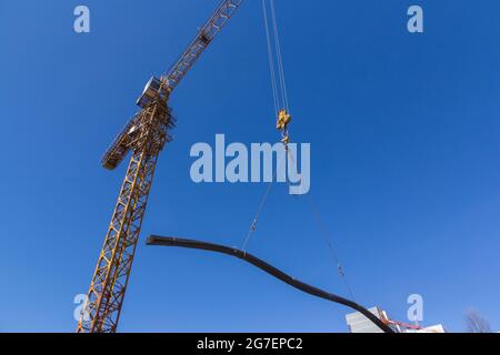 Construction crane at a construction site. Mechanisms for lifting ...
