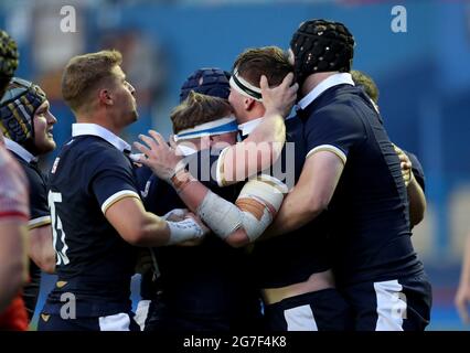 Scotland’s Ben Muncaster celebrates with his team mates after scoring a ...