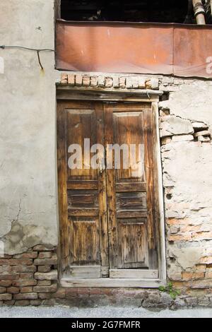 A vertical shot of an old wooden door Stock Photo - Alamy